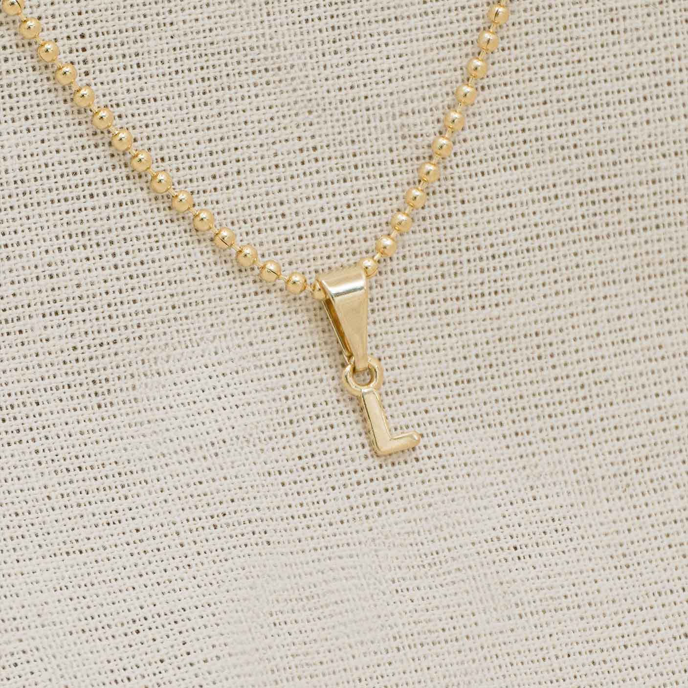 Dije Letra L – Inversiones palacio joyeria